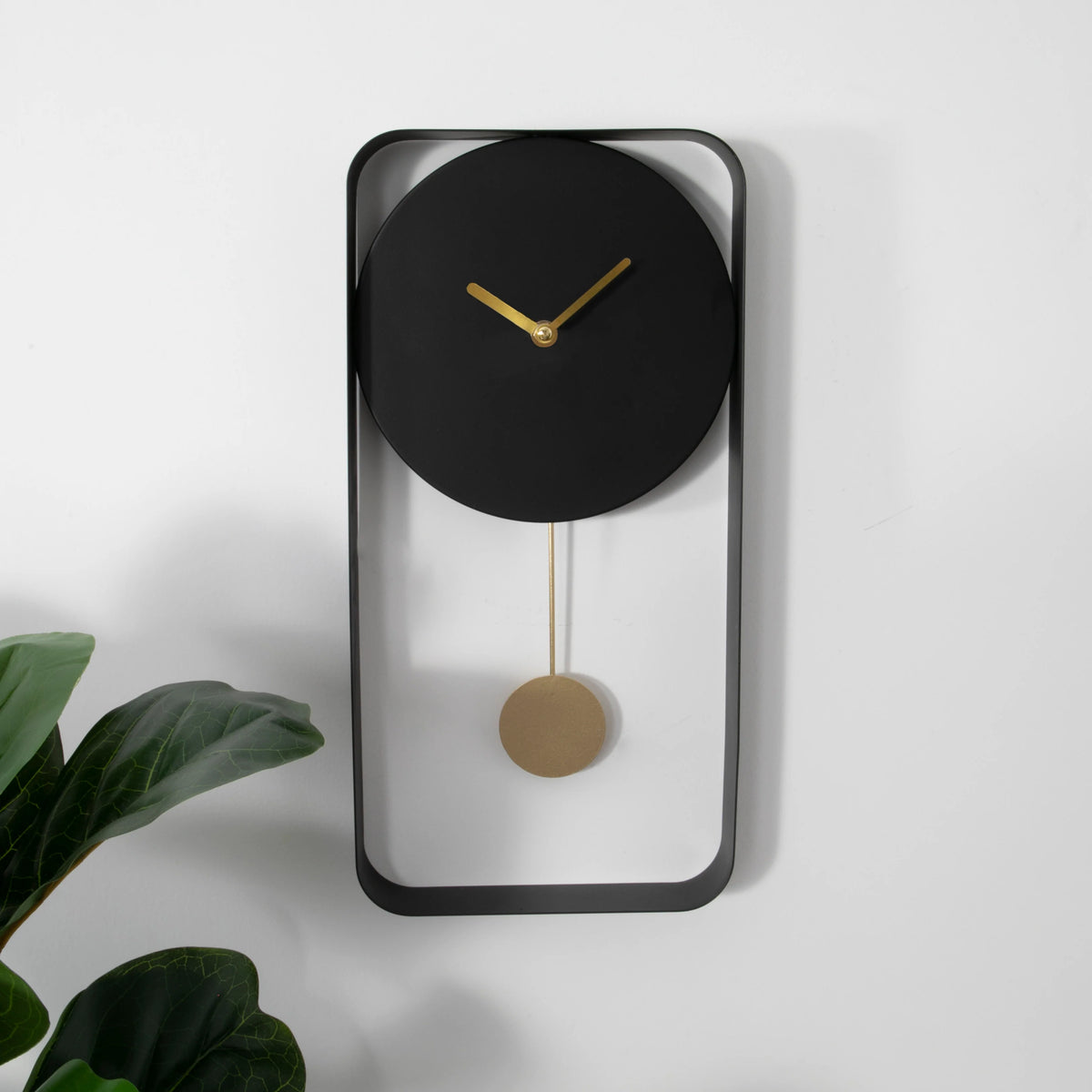 Matte Black Metal Wall Clock with Gold Details | Modern Home Interiors